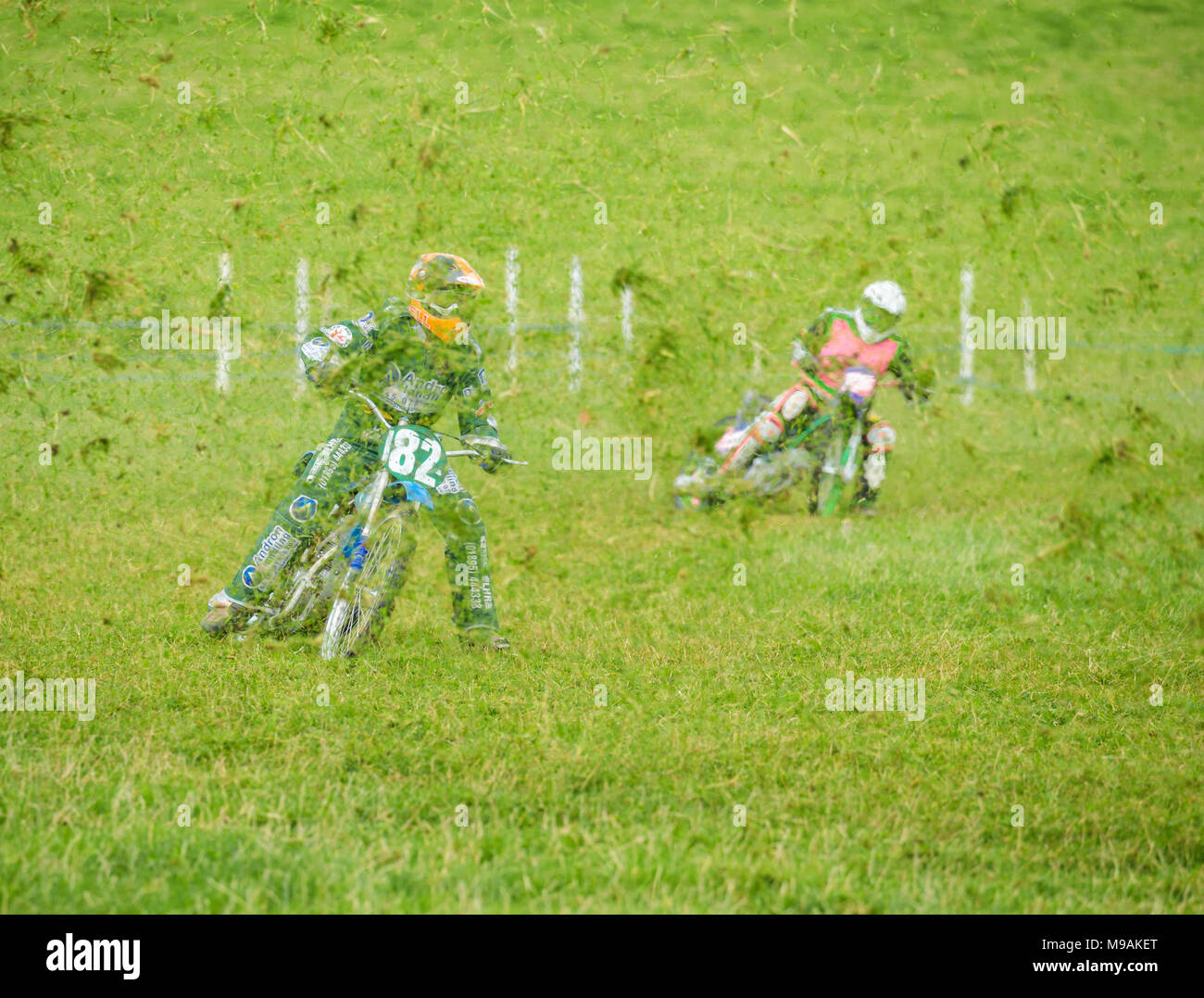 Grass track motorcycle racing action Stock Photo - Alamy