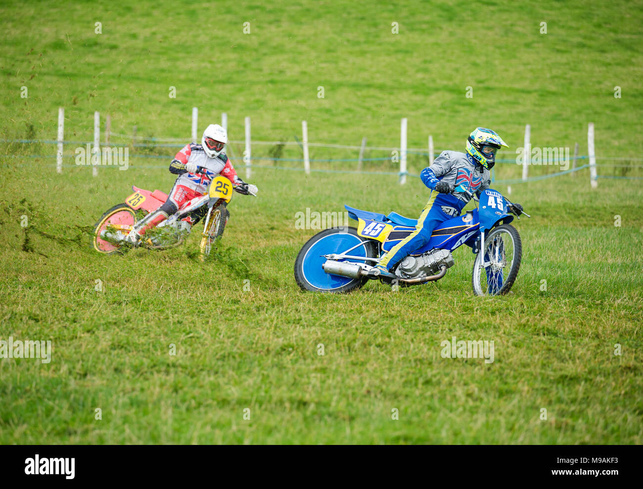 Grass track motorcycle racing action Stock Photo - Alamy