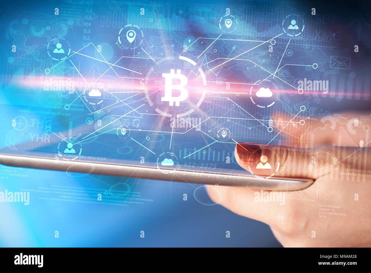 Hand using tablet with cryptocurrency bitcoin link network and online ...