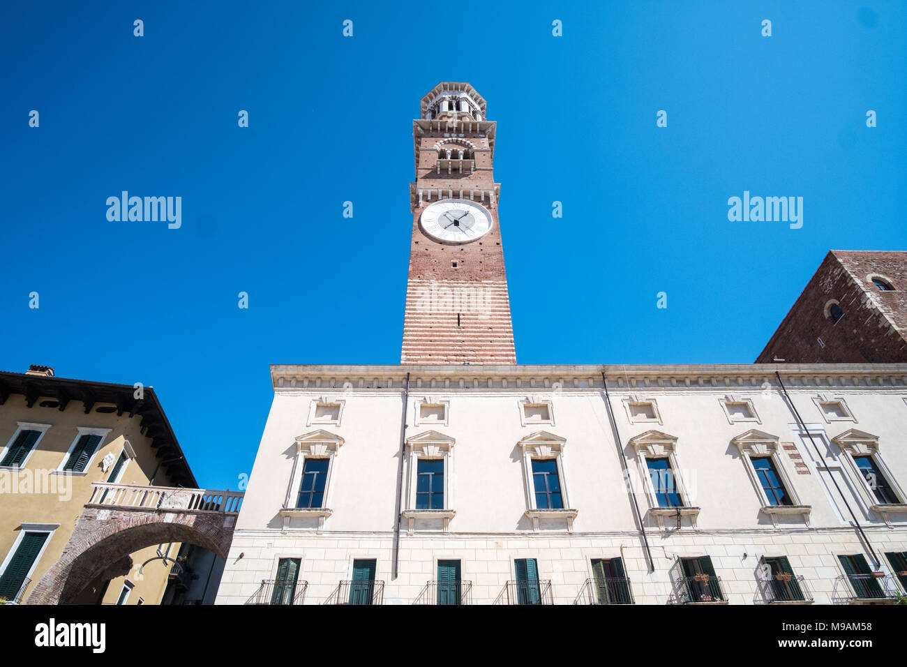 Torre dei Lamberti, the clock tower in Piazza delle Erbe. Verona, Italy ...