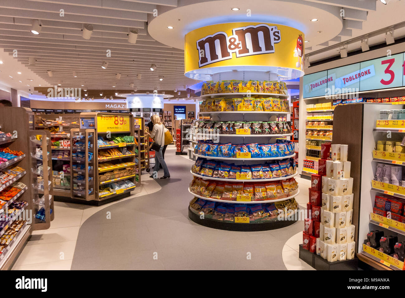 Displays of huge amounts of sweet sugary products at the airport Stock ...