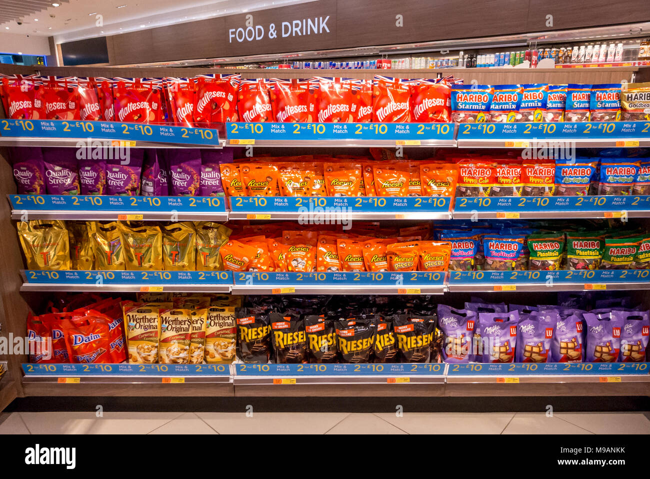 Displays of huge amounts of sweet sugary products at the airport Stock ...