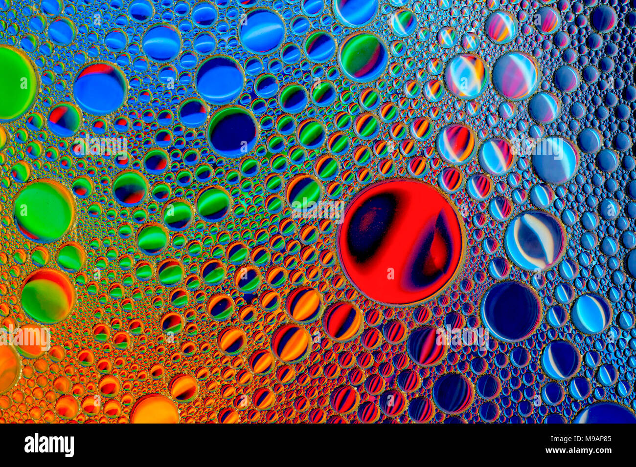 Colorful abstract oil bubbles in water Stock Photo - Alamy