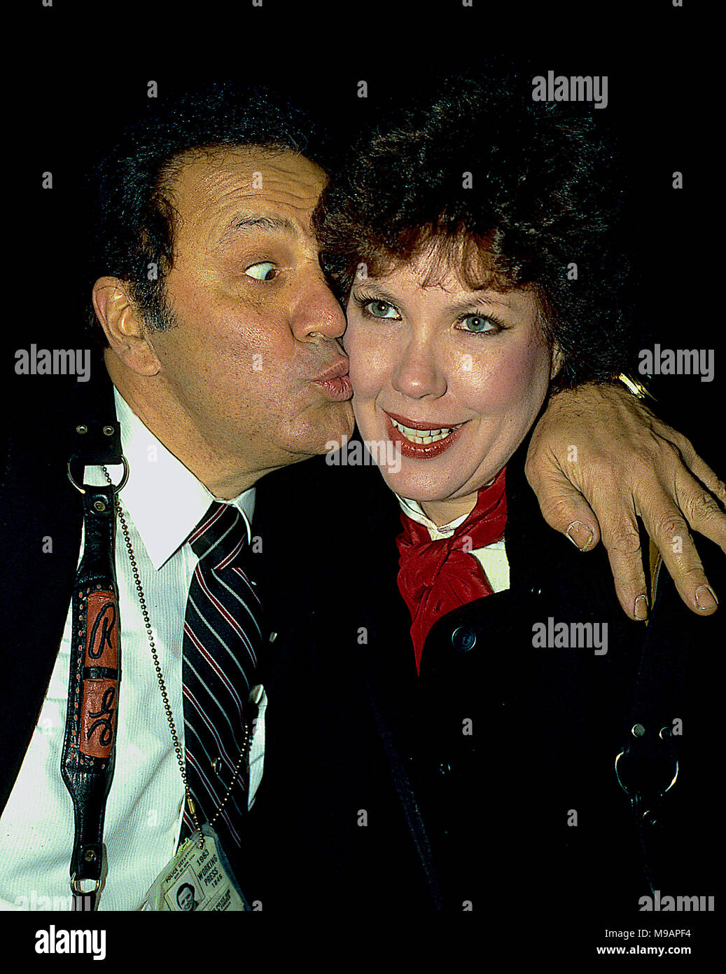 Washington, DC., USA, December 3, 1983 Ron Galella kisses his wife ...