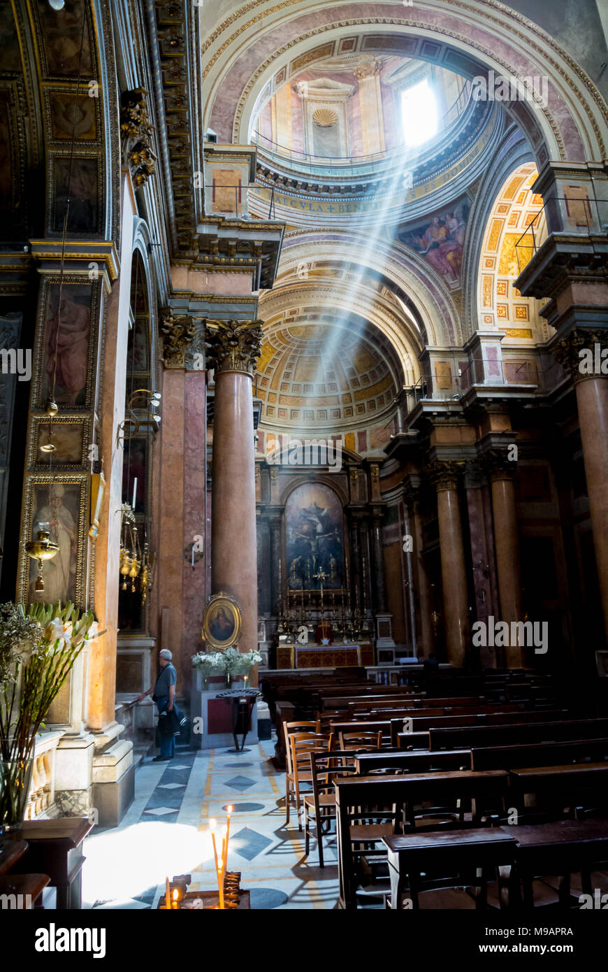 sunbeam from ceiling of catolic church, rome, italy Stock Photo - Alamy