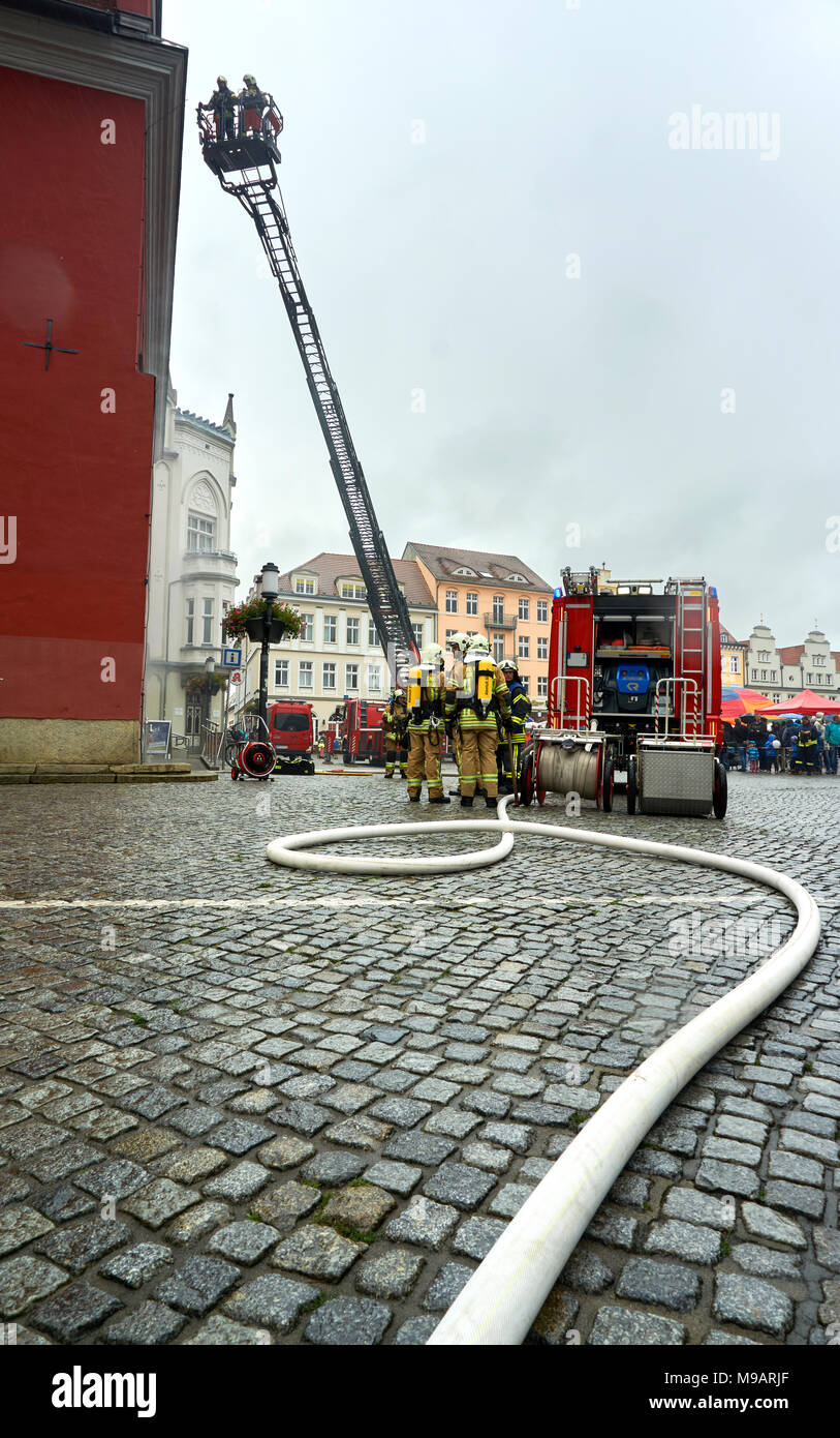 fire fighter practicing rescue action Stock Photo - Alamy