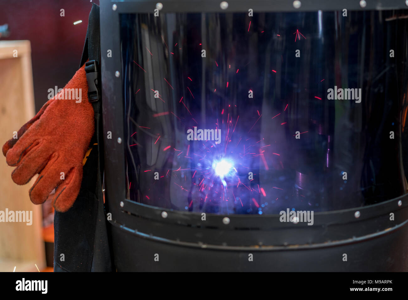 Welding process. view through protective glass Stock Photo - Alamy