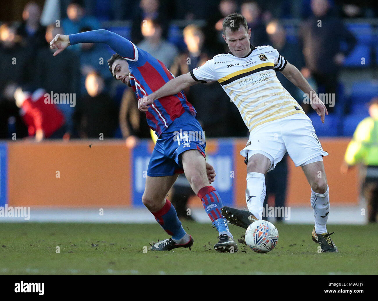 Dumbarton's Andy Dowie (L) competes with Inverness Caledonian Thistle's ...