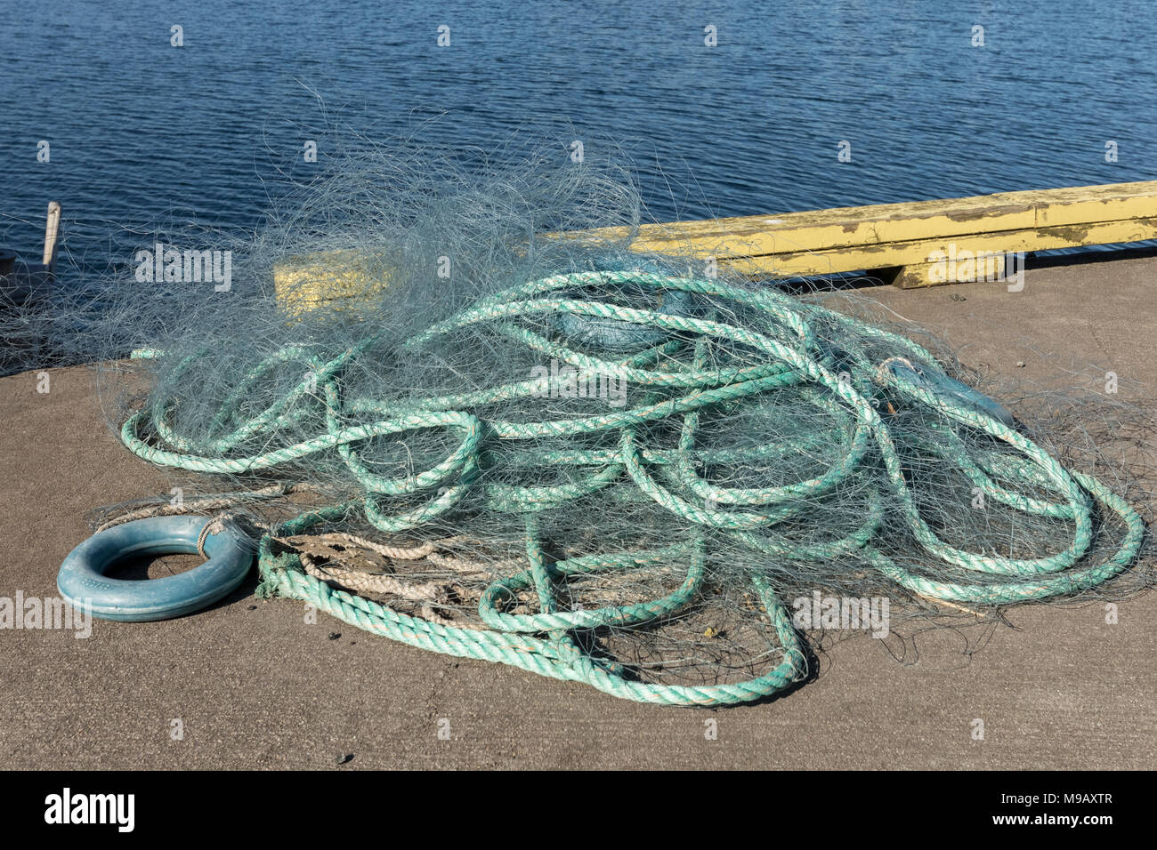 Nets used in commercial fishing hi-res stock photography and images - Alamy