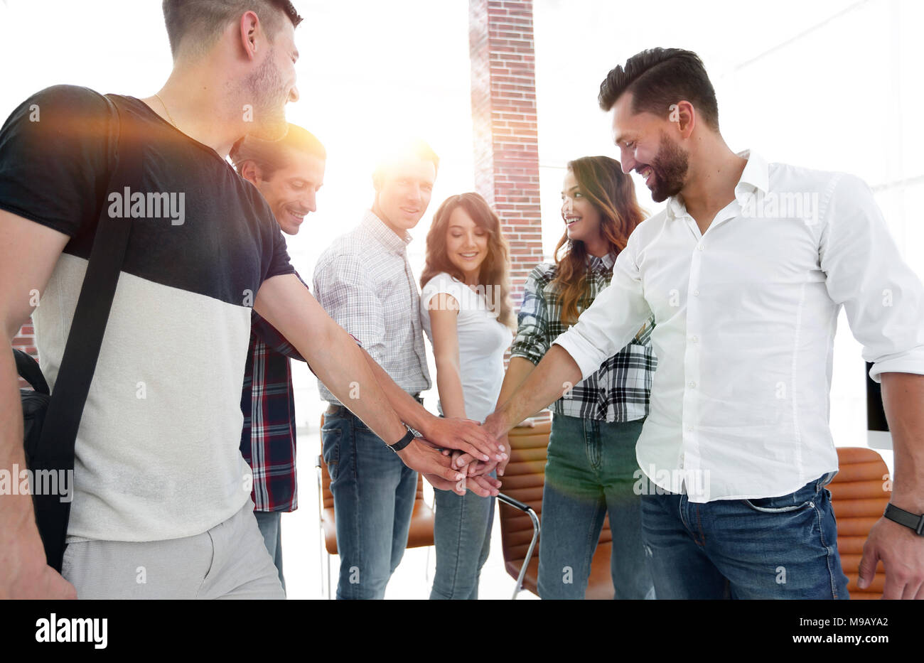 closeup .creative team folded their hands together Stock Photo - Alamy