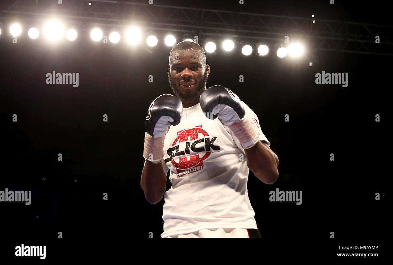 Chris Kongo celebrates after winning against Serge Ambomo in the ...