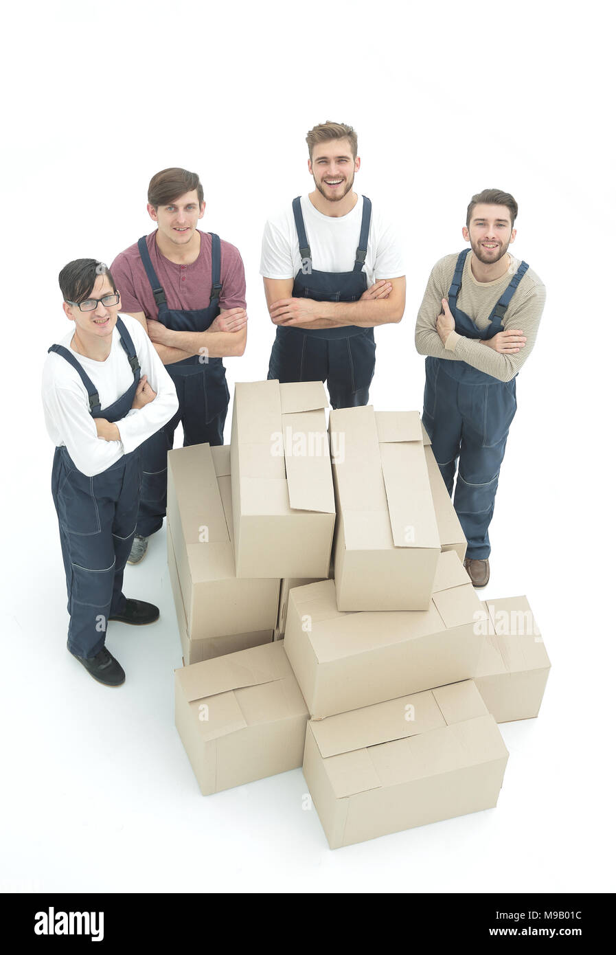 Happy smiling movers carrying boxes, isolated on white backgroun Stock ...