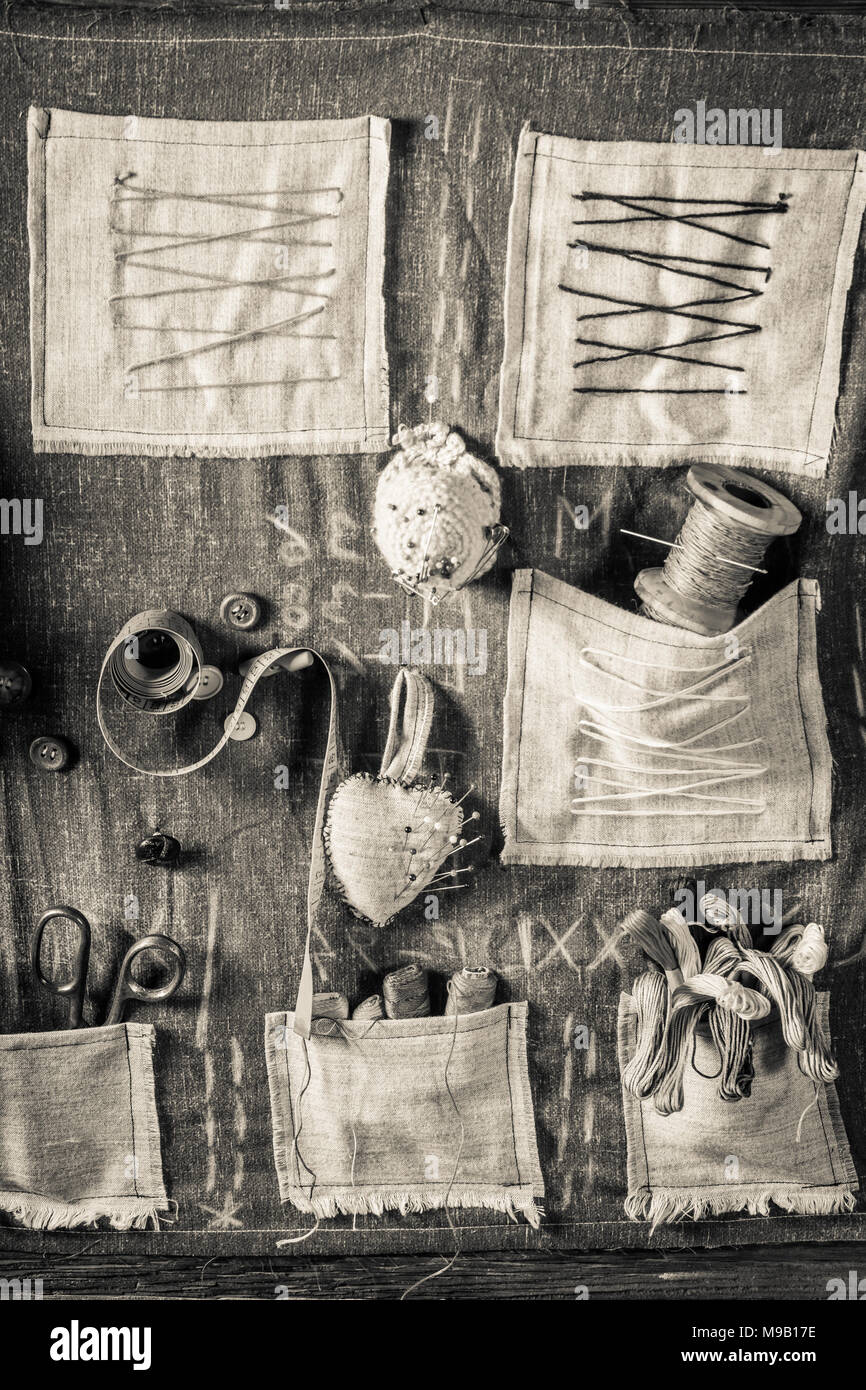 Handmade sewing mat with buttons, needles and threads Stock Photo - Alamy