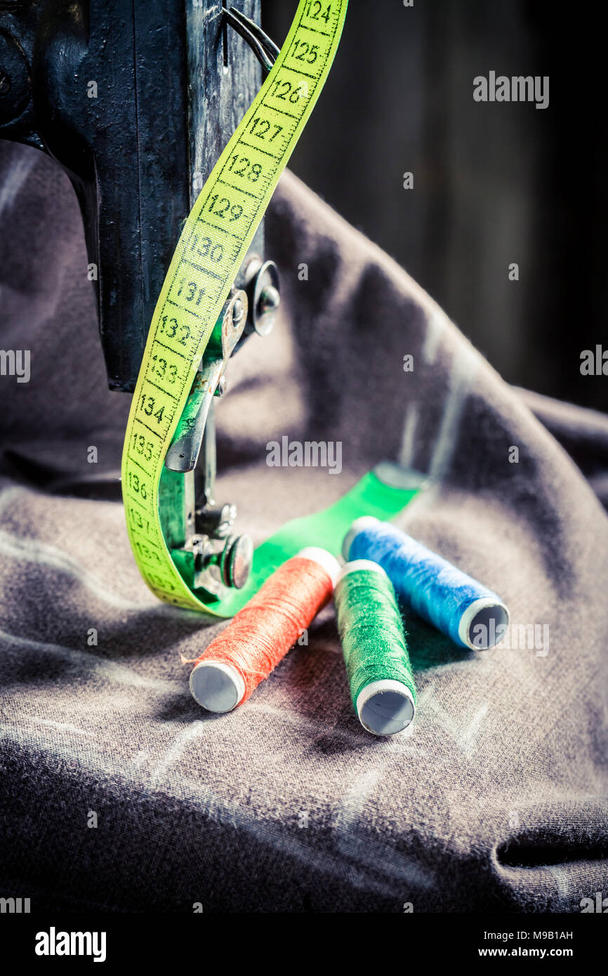 Sewing machine with tailor tape, threads, scissors and cloth Stock ...