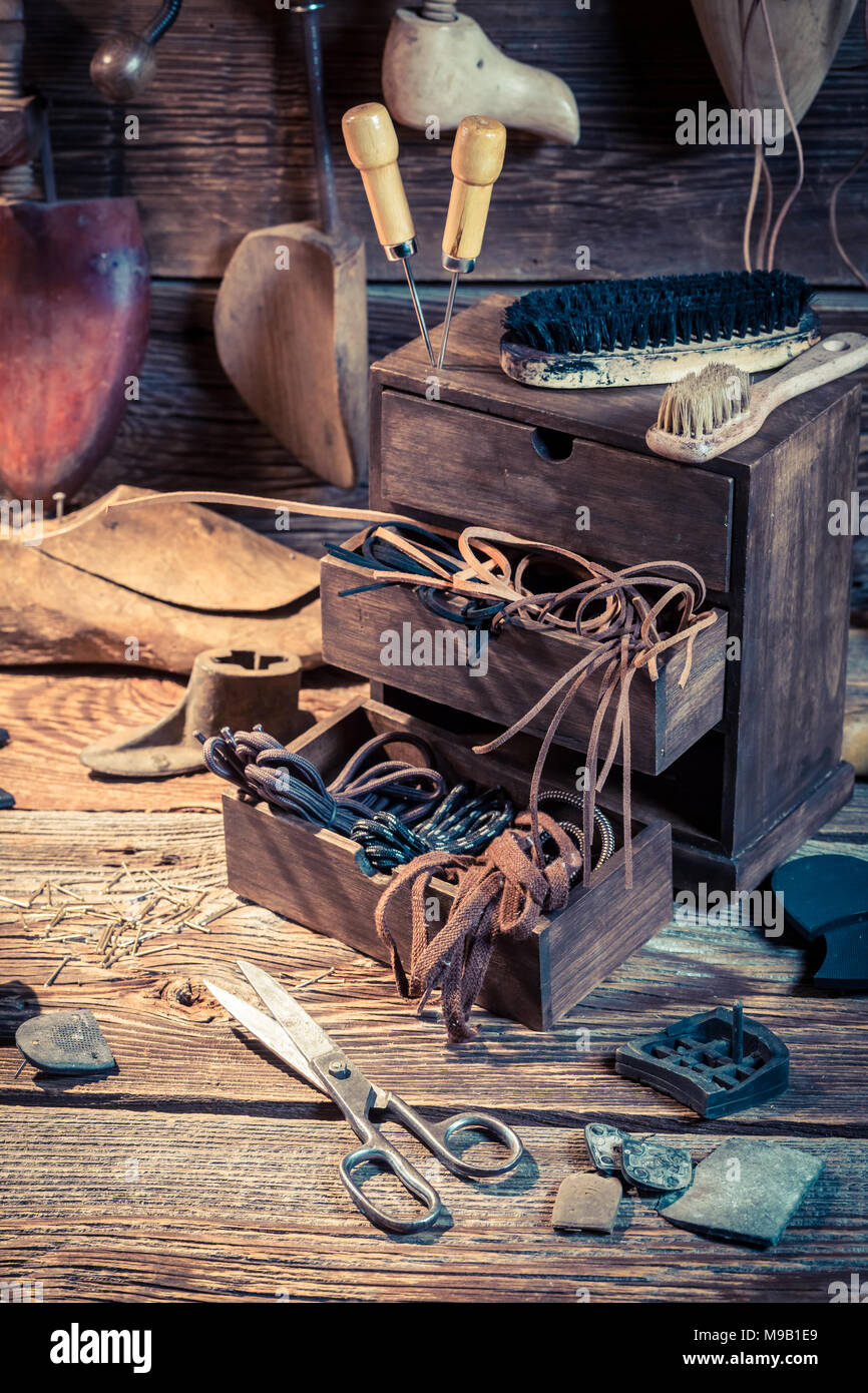 Shoemaker workplace brush shoes hi-res stock photography and images - Alamy