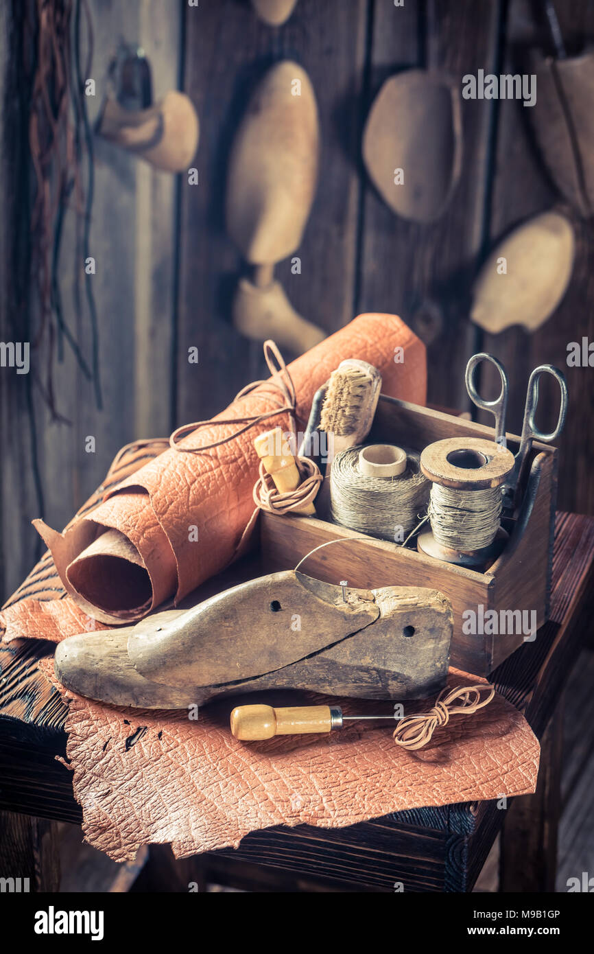 Workplace to making shoes of leather, threads and template Stock Photo ...