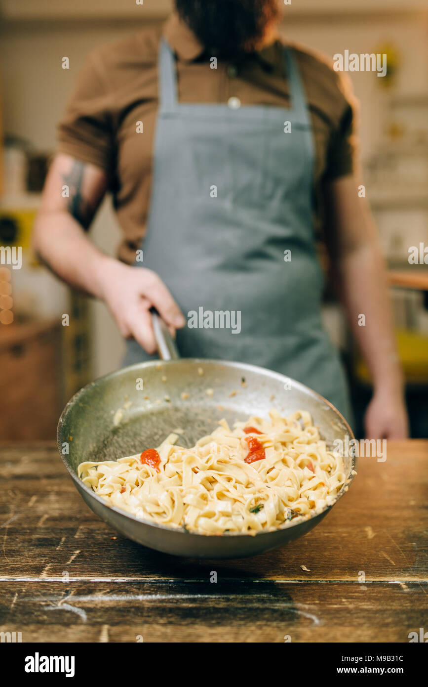 Pan with pasta hi-res stock photography and images - Alamy