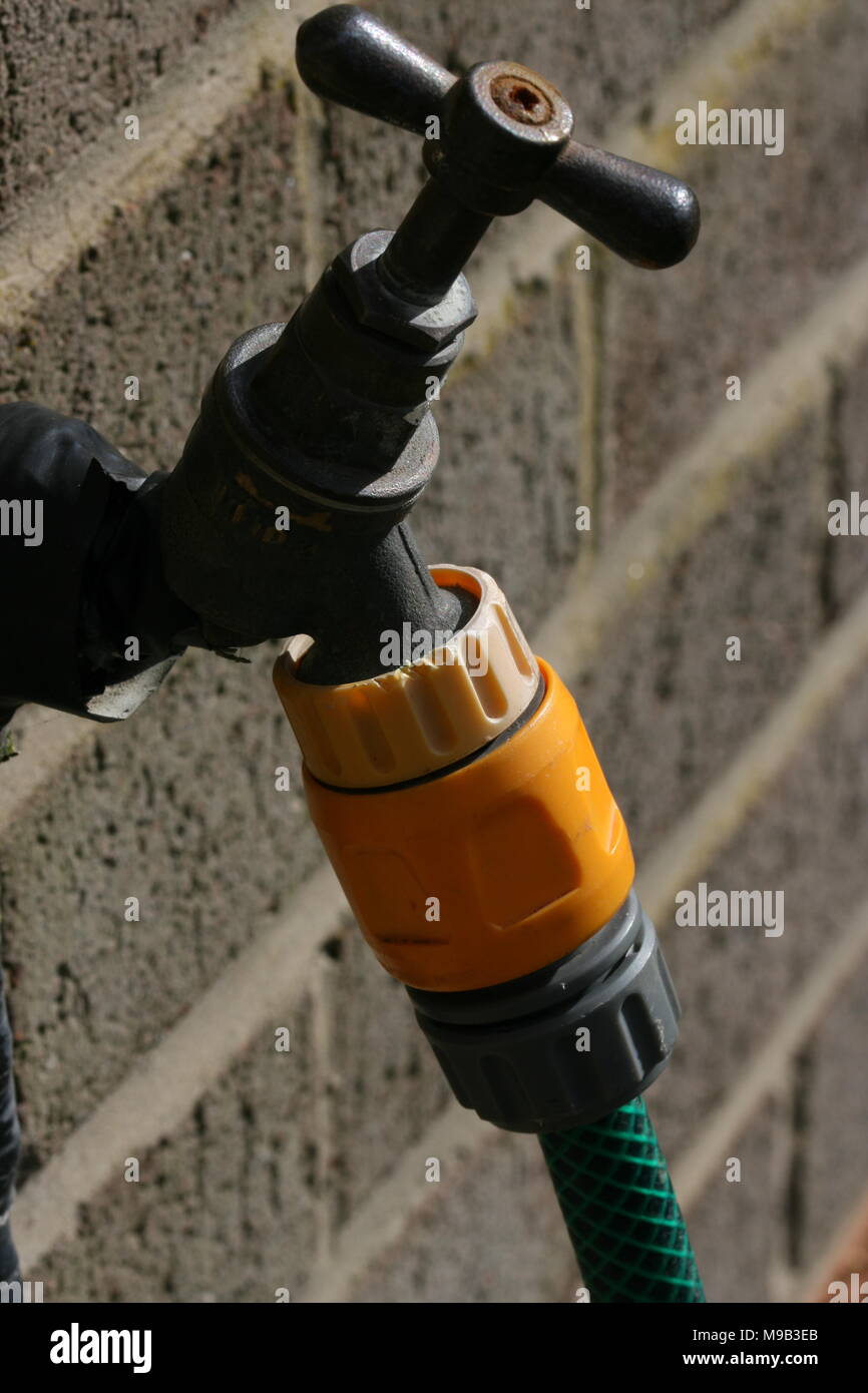 Hosepipe and Tap Stock Photo - Alamy