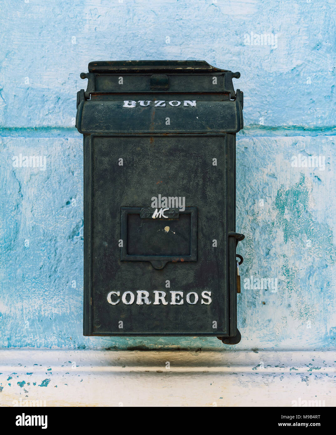 Cuban blue vintage mailbox. An old blue mailbox on a historic 16th ...
