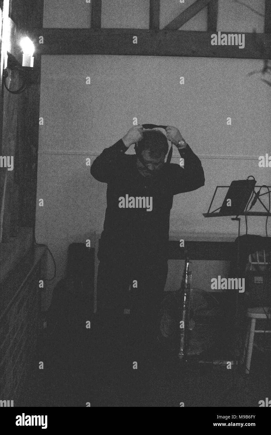 Black and White still of saxophonist, Joe Green getting ready for a ...