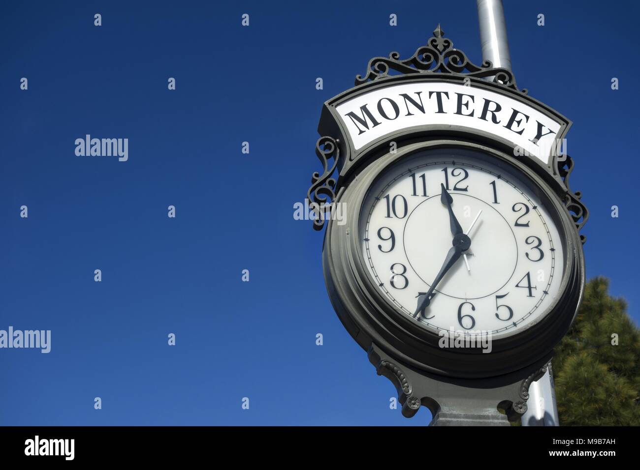 Street Clock showing time at entrance to Monterey Peninsula Harbor near ...