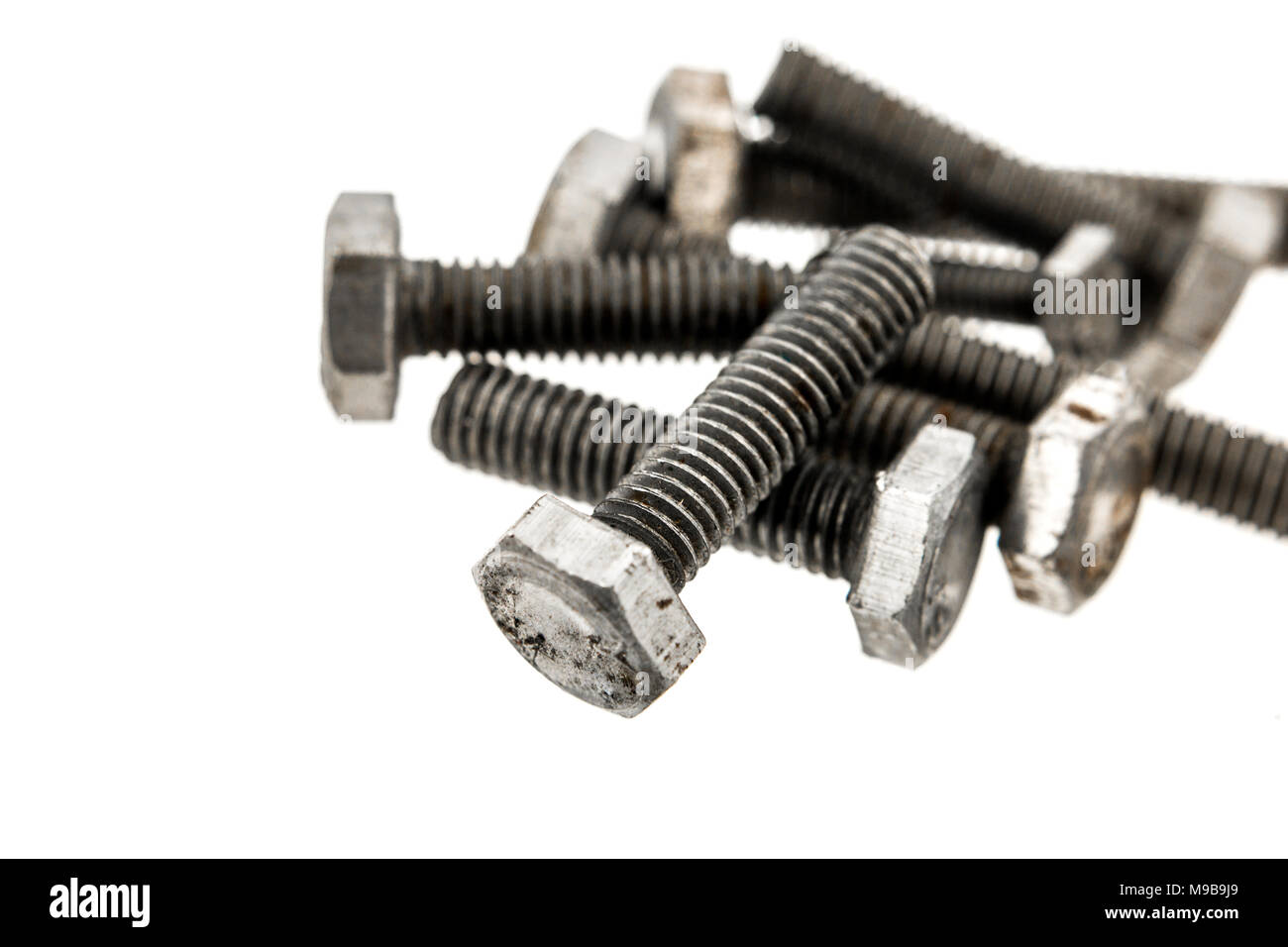 Close up bolts isolated on white background Stock Photo - Alamy