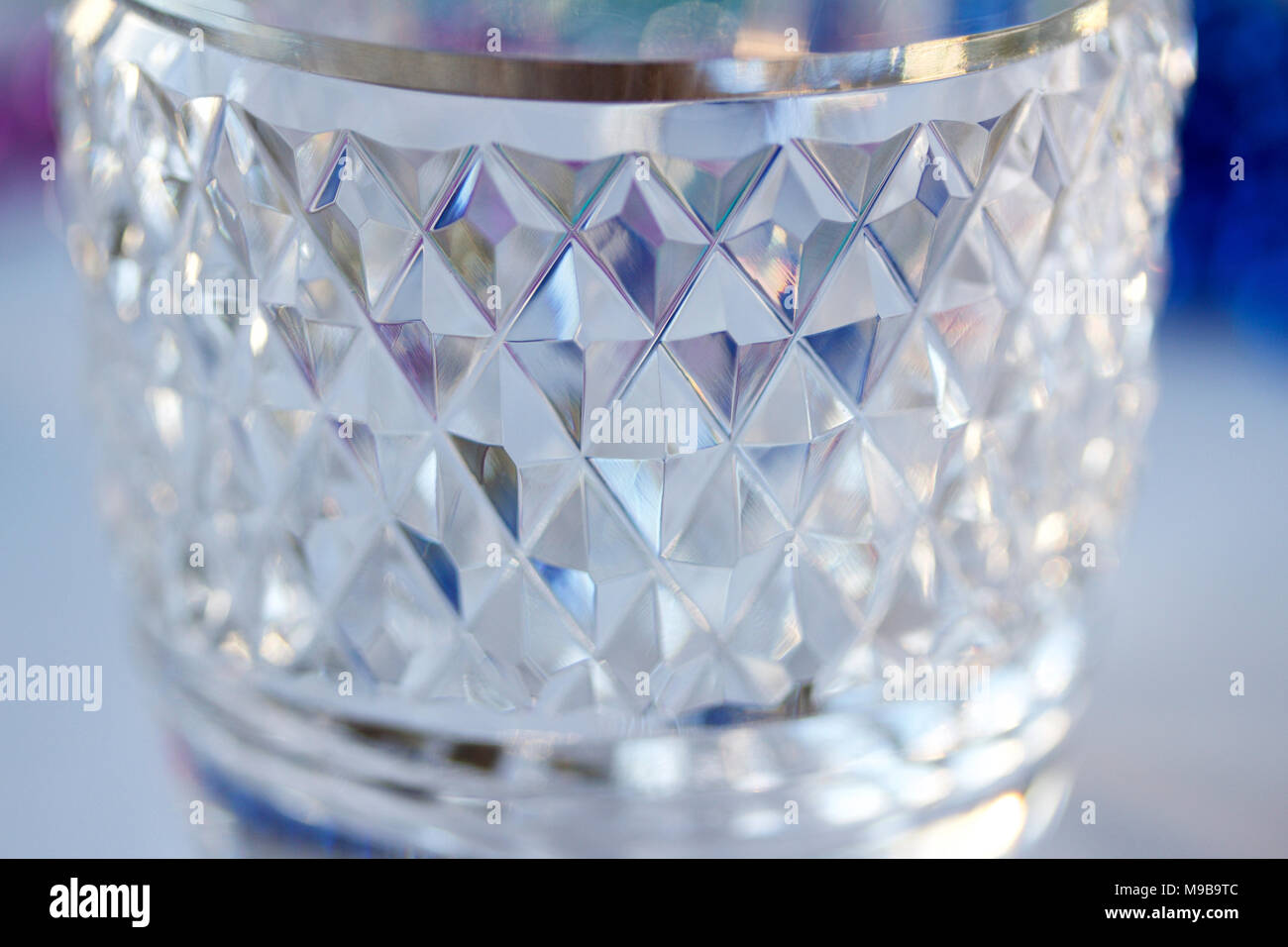 Macro view of beautiful diamond cut lead crystal glass surface ...