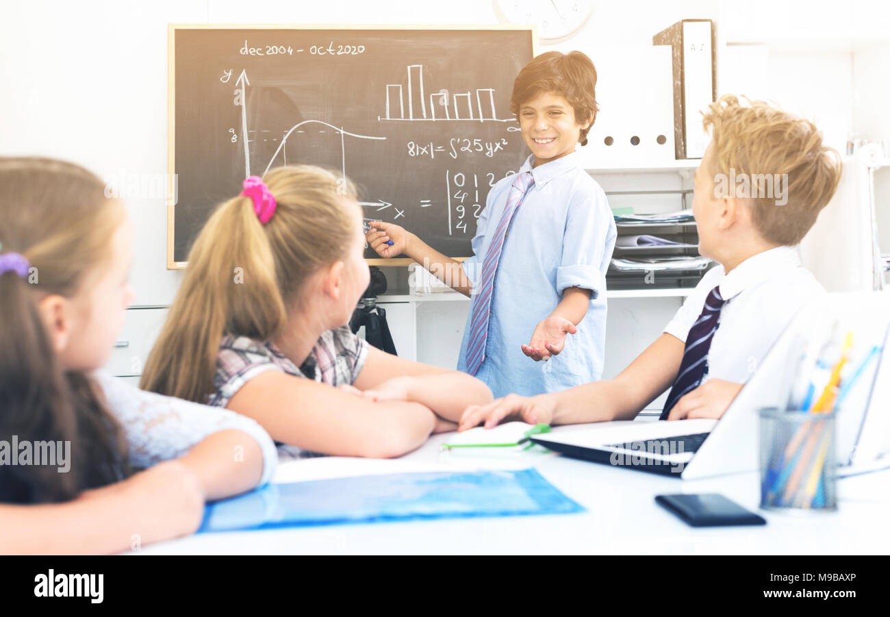 Teens male discussing about mathematical formulas with friends Stock ...