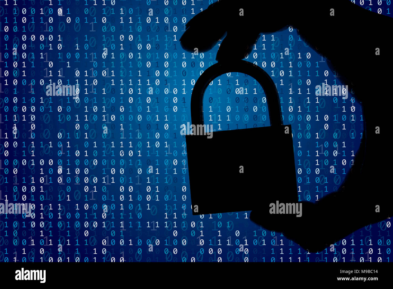Silhouette of a hand holding a padlock with binary digital code ...