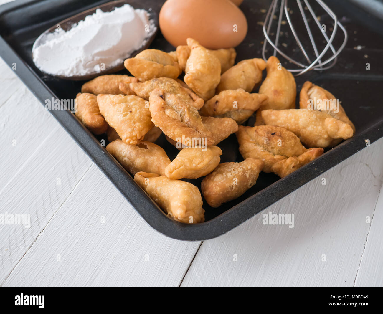 Karee puff, eggs and powder on white wooden background, Ingredients for ...