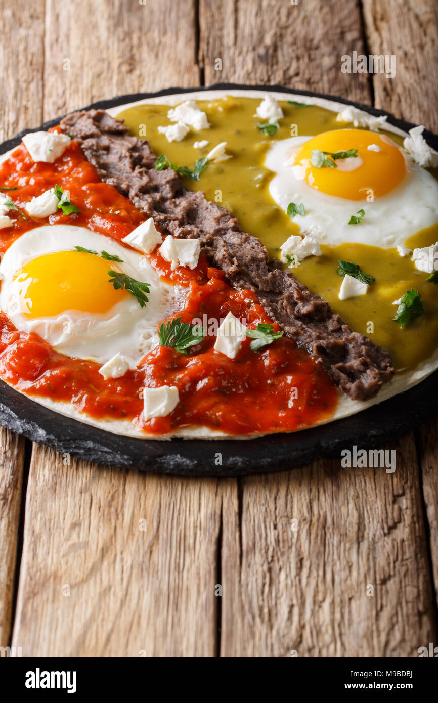 Mexican breakfast: eggs huevos divorciados with beans Frijoles refritos ...