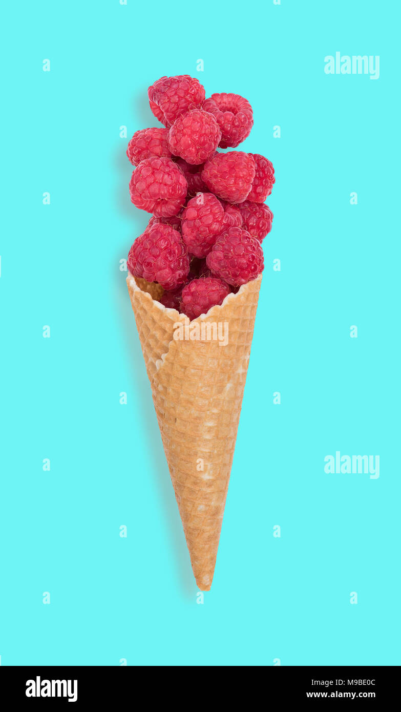 Raspberry ice cream cone with fresh fruits Stock Photo - Alamy