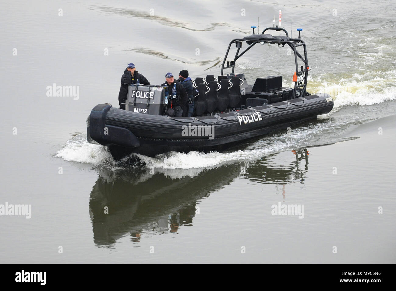 London, UK, 24 Mar 2018. A police RIB (Rigid Inflatable Boat) on patrol ...