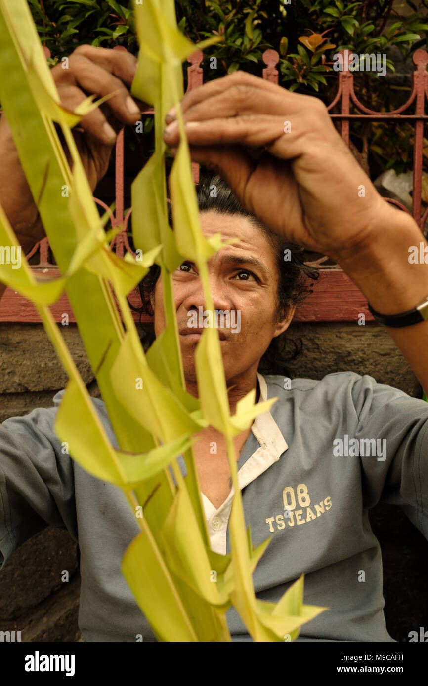 'palaspas' palm frond maker and seller in Binondo, Manila Stock Photo ...