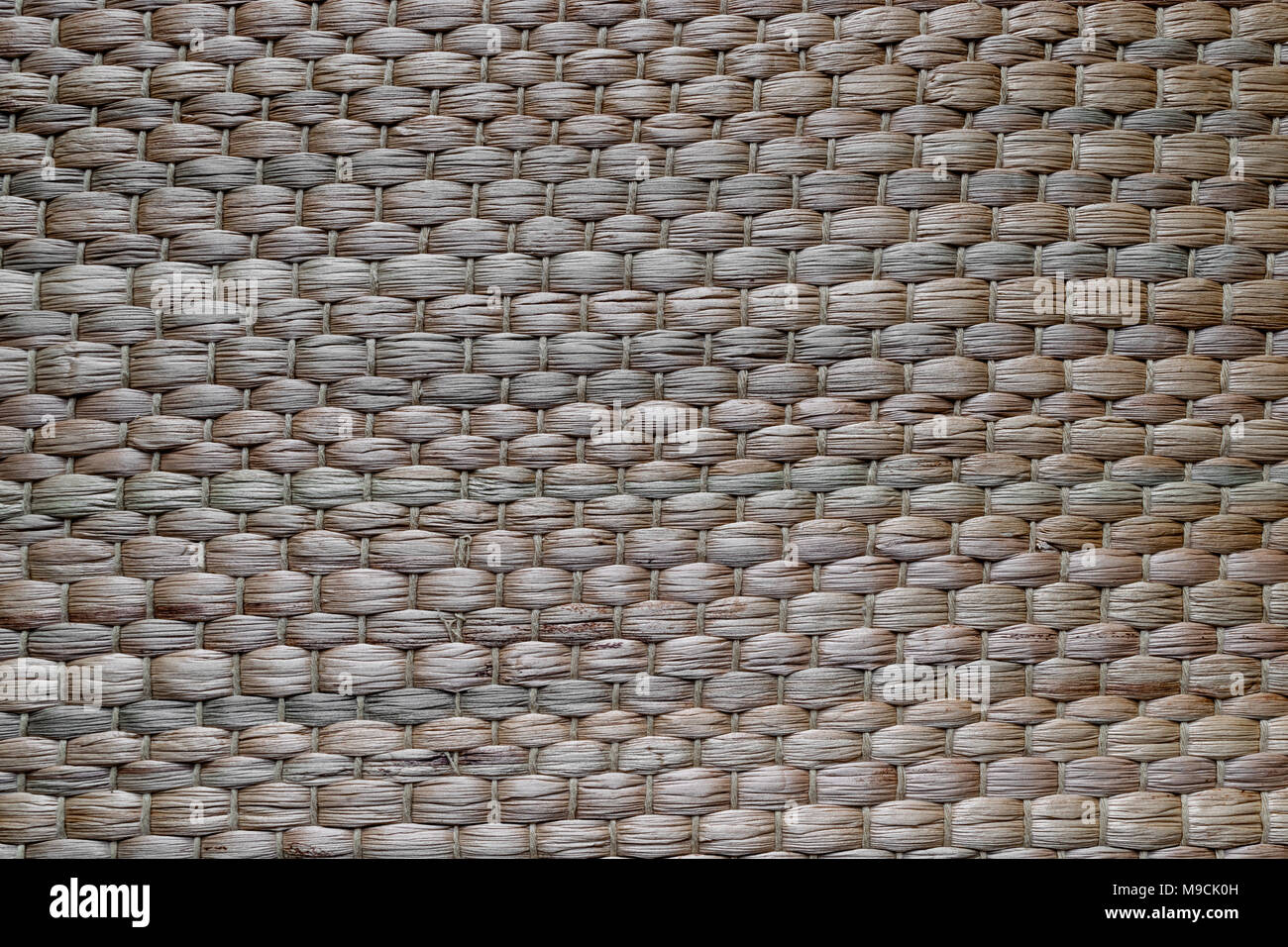Brown pattern of straw mat background surface. Straws tied between each ...