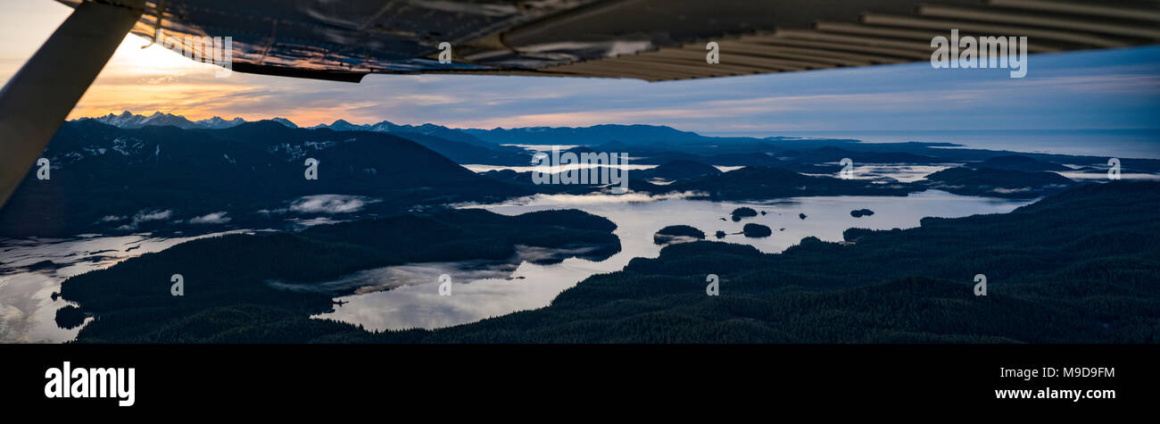 Flying through the mountains Stock Photo - Alamy