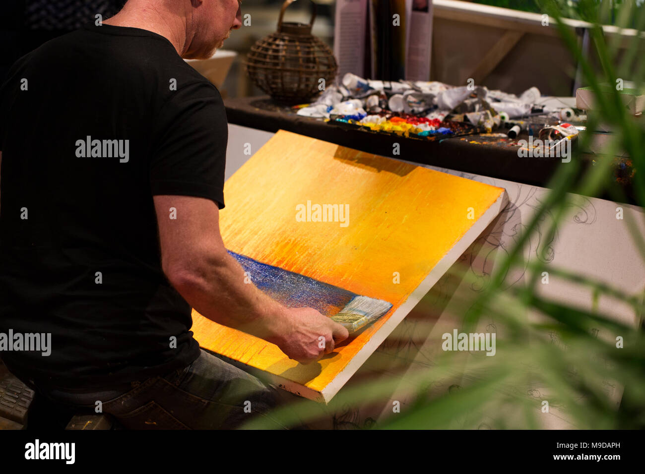 An artist at work at a garden show in Boston Stock Photo - Alamy