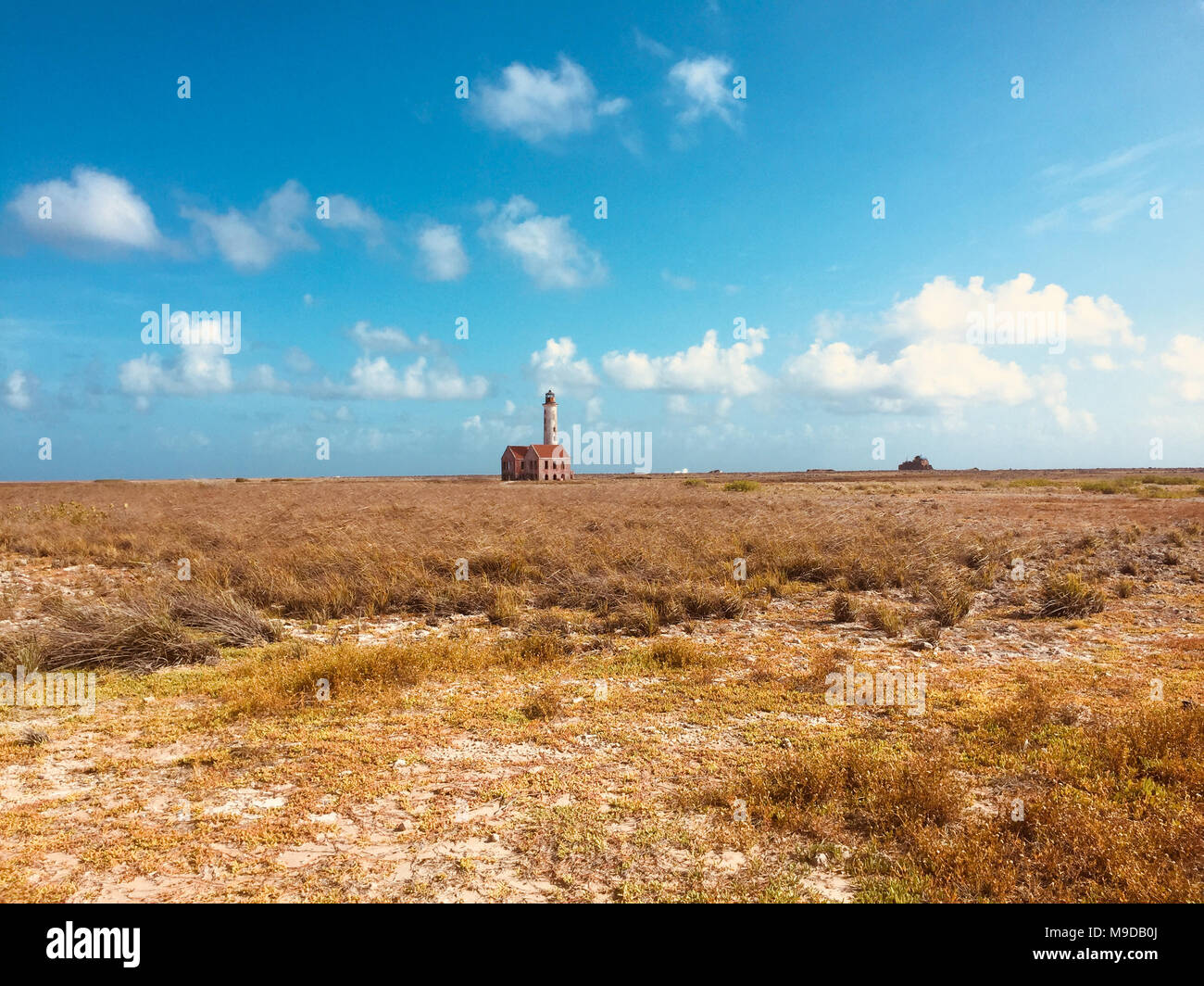Beautiful landscape, blue sky and old lighthouse tower on Klein Curacao ...