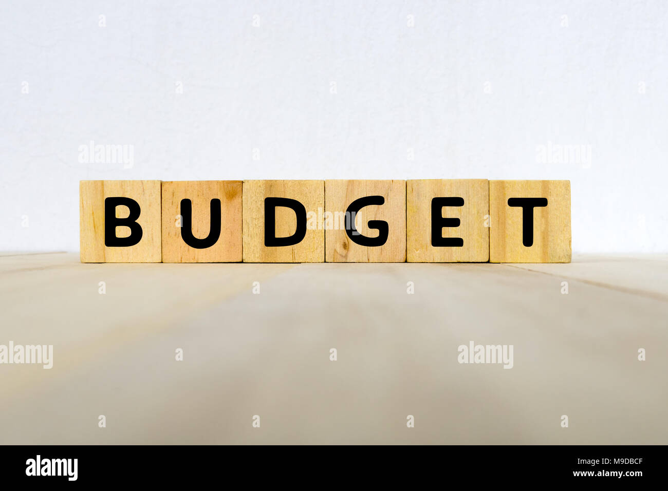 Budget Word on wood block - business and home finance concept Stock ...