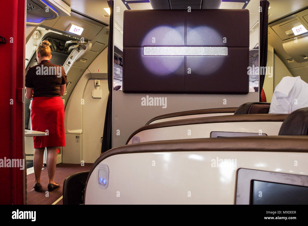 Crew preparing for the boarding of the Upper Class cabin on an Airbus ...