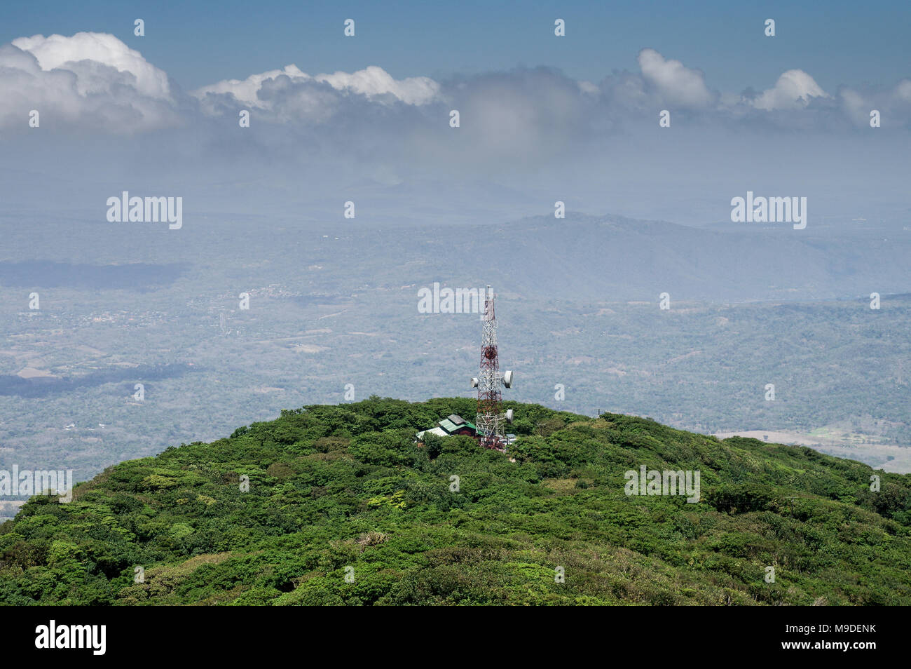 View of the surrounding countryside and a lower peak from Mombacho ...