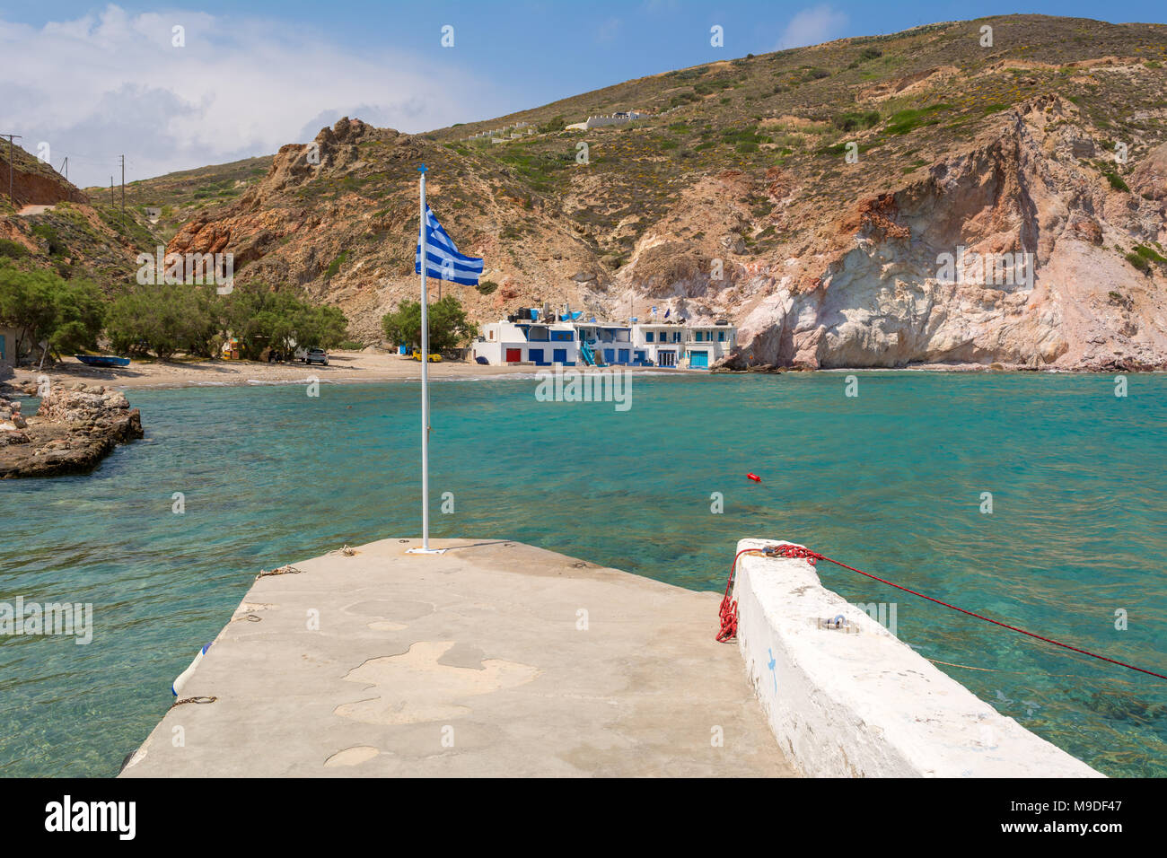 Fishing port and a beach with amazing blue water in Firopotamos Bay ...