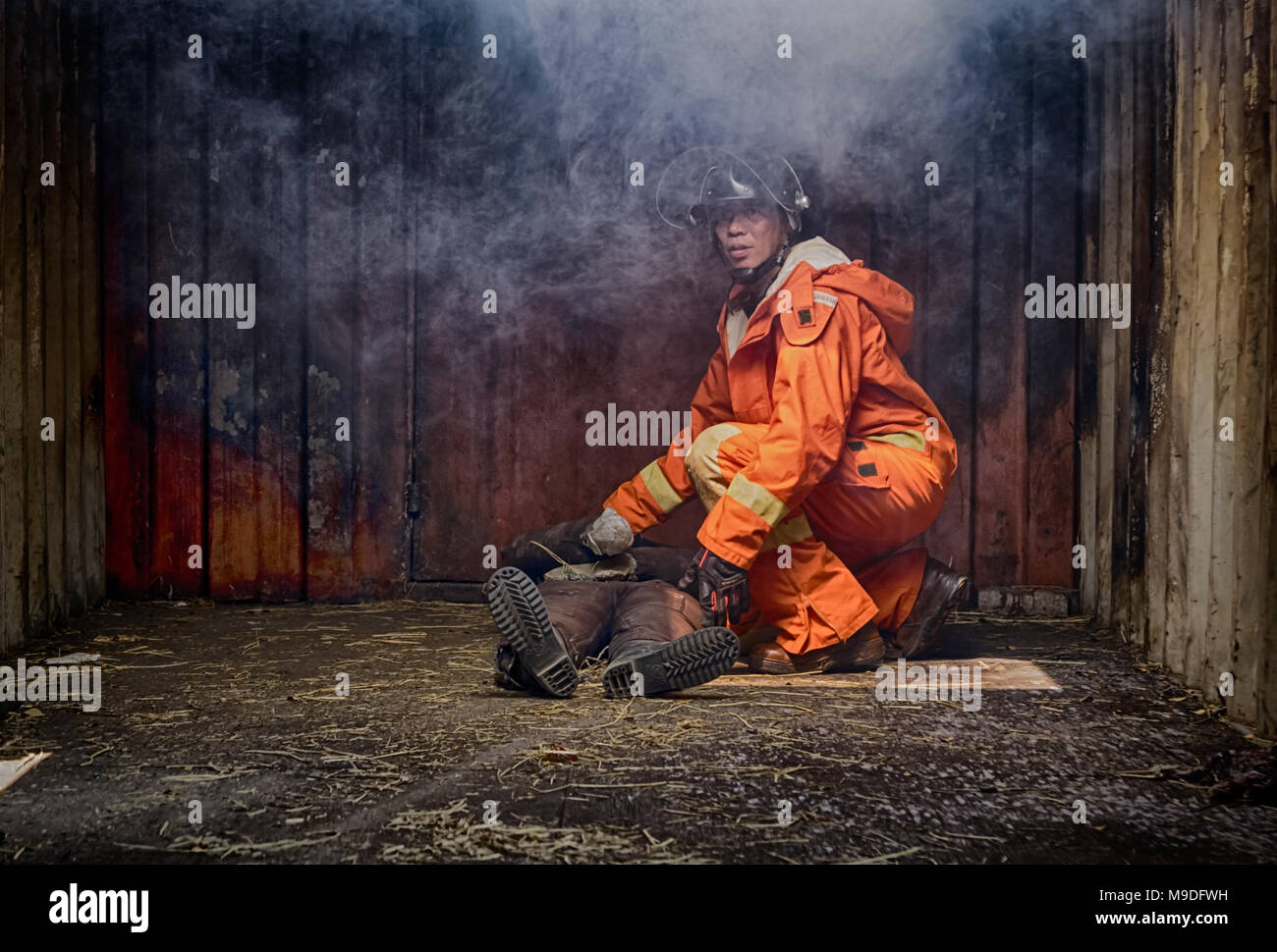 Firefighter rescue child hi-res stock photography and images - Alamy