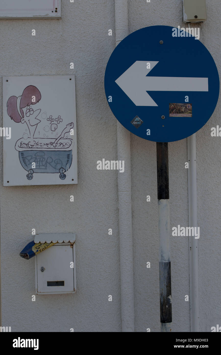 White arrow on blue background one way street sign in paphos, cyprus ...