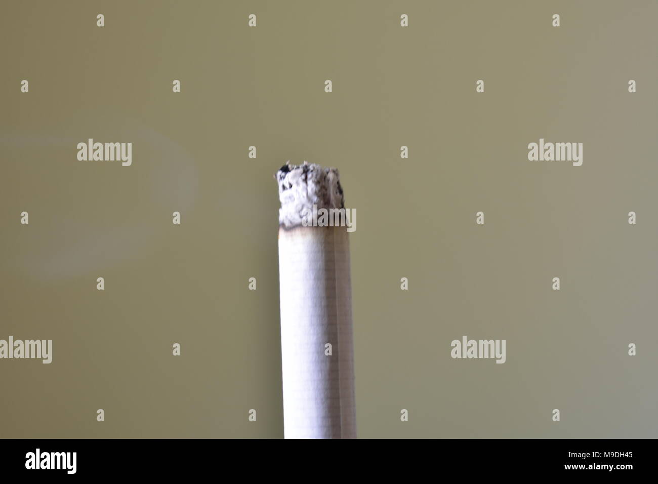 Burning cigarette hi-res stock photography and images - Alamy