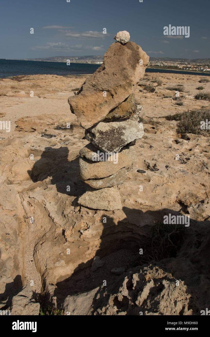 Rock stack on kato-paphos beach on the mediterranean coast of cyprus ...