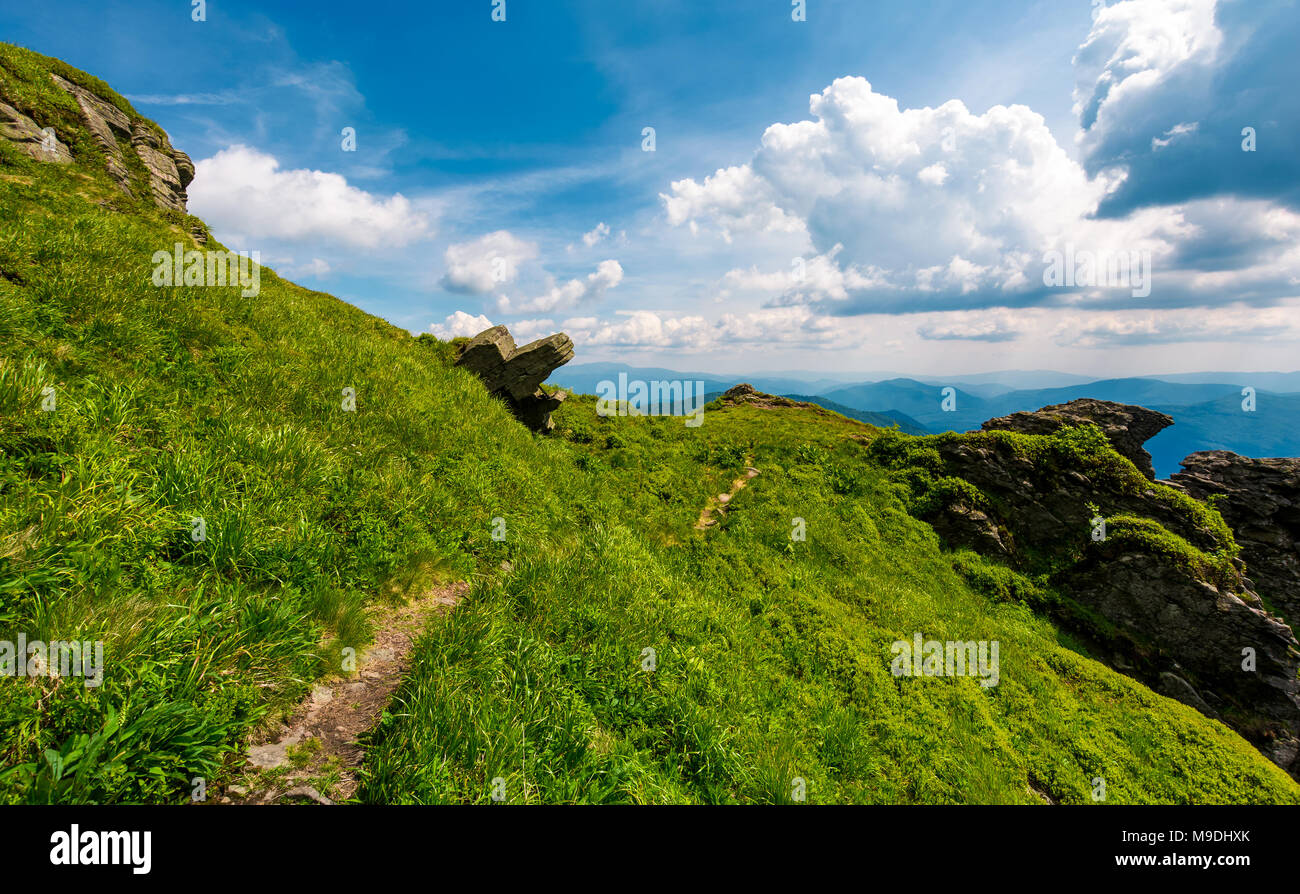 path to the edge of a hill. beautiful mountainous landscape with grassy ...
