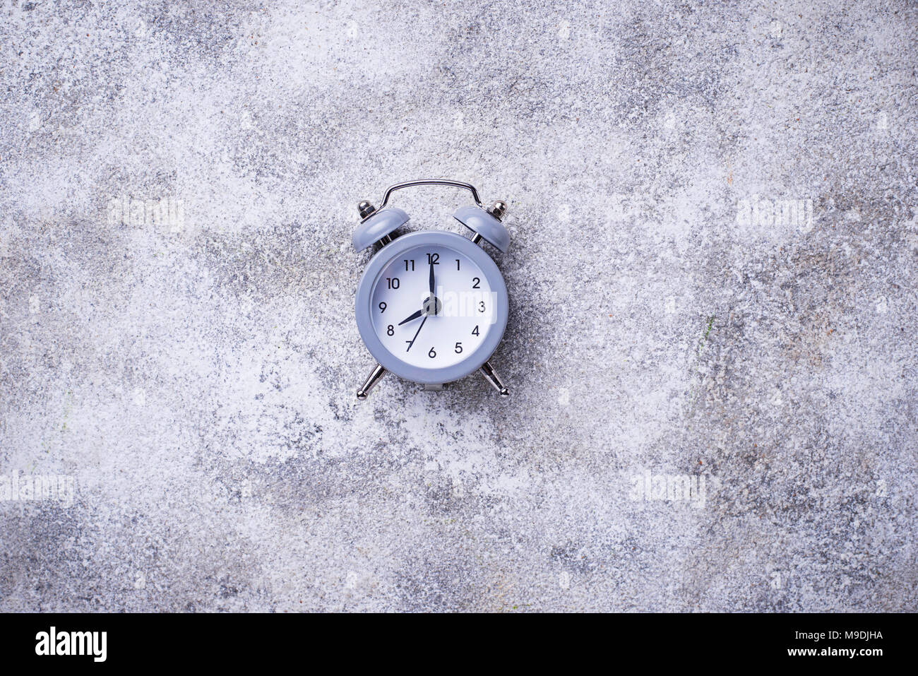 Alarm clock on concrete hi-res stock photography and images - Alamy