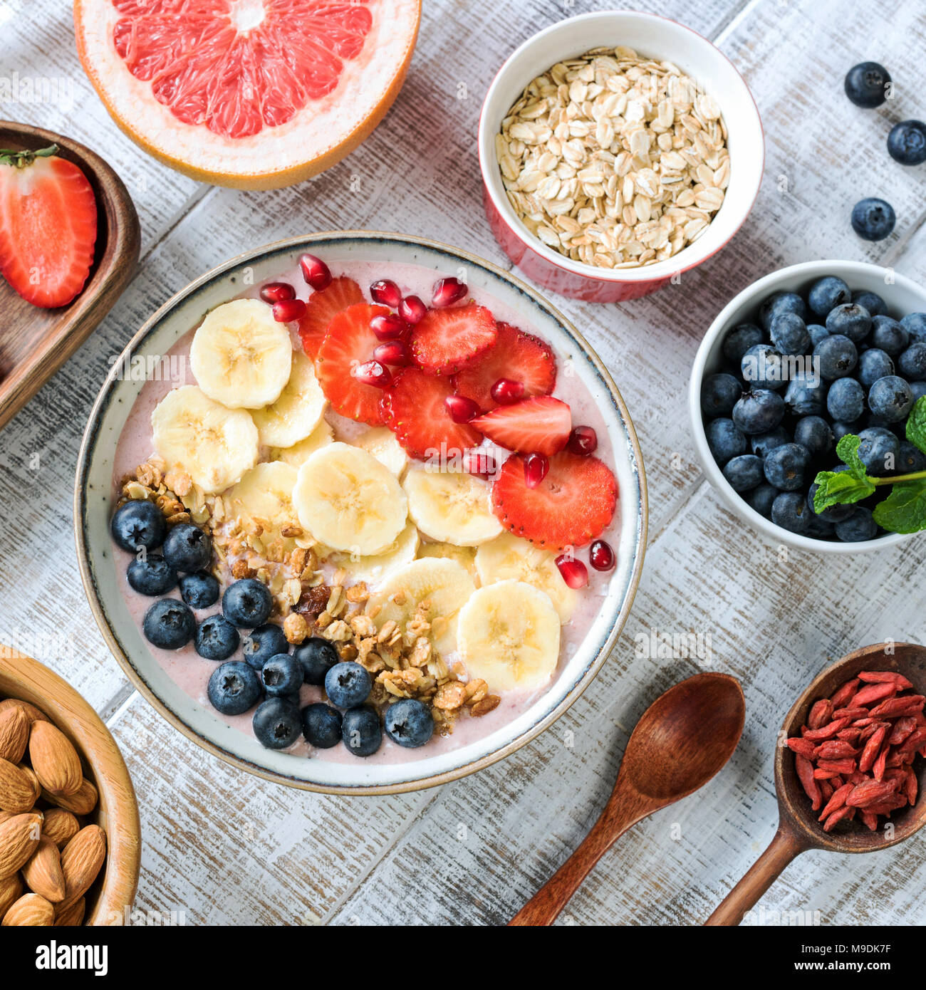 Acai smoothie bowl with banana, strawberries, blueberries and granola ...
