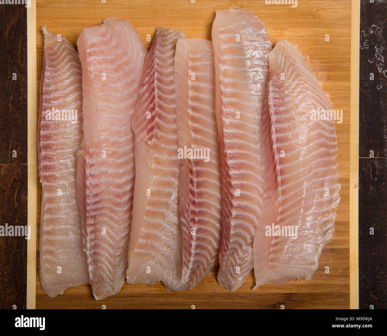 Close up tilapia fish fillet hi-res stock photography and images - Alamy